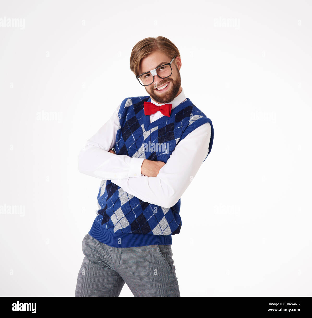 Cheerful nerd on white background Stock Photo - Alamy