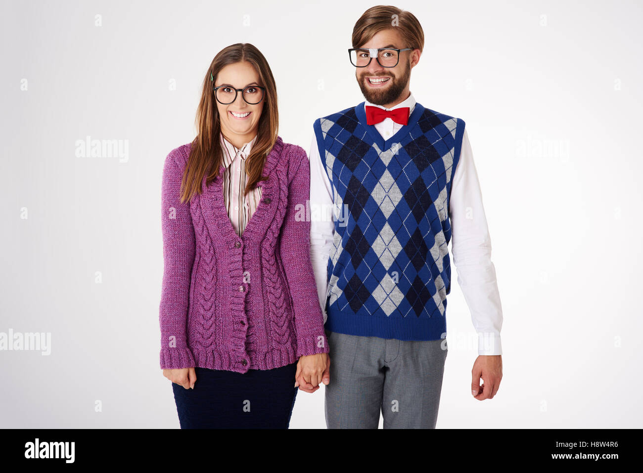 Nerds holding hands very shyly Stock Photo - Alamy