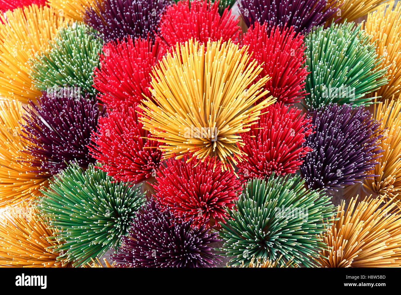 Colored incense sticks Stock Photo - Alamy