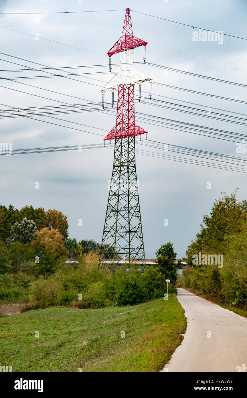 Red and white Electric pylon conducting electric power from the ...