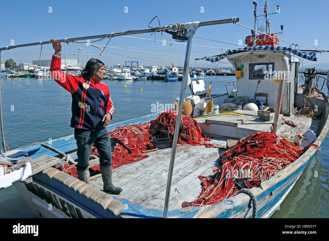 Fisherman working hi-res stock photography and images - Alamy