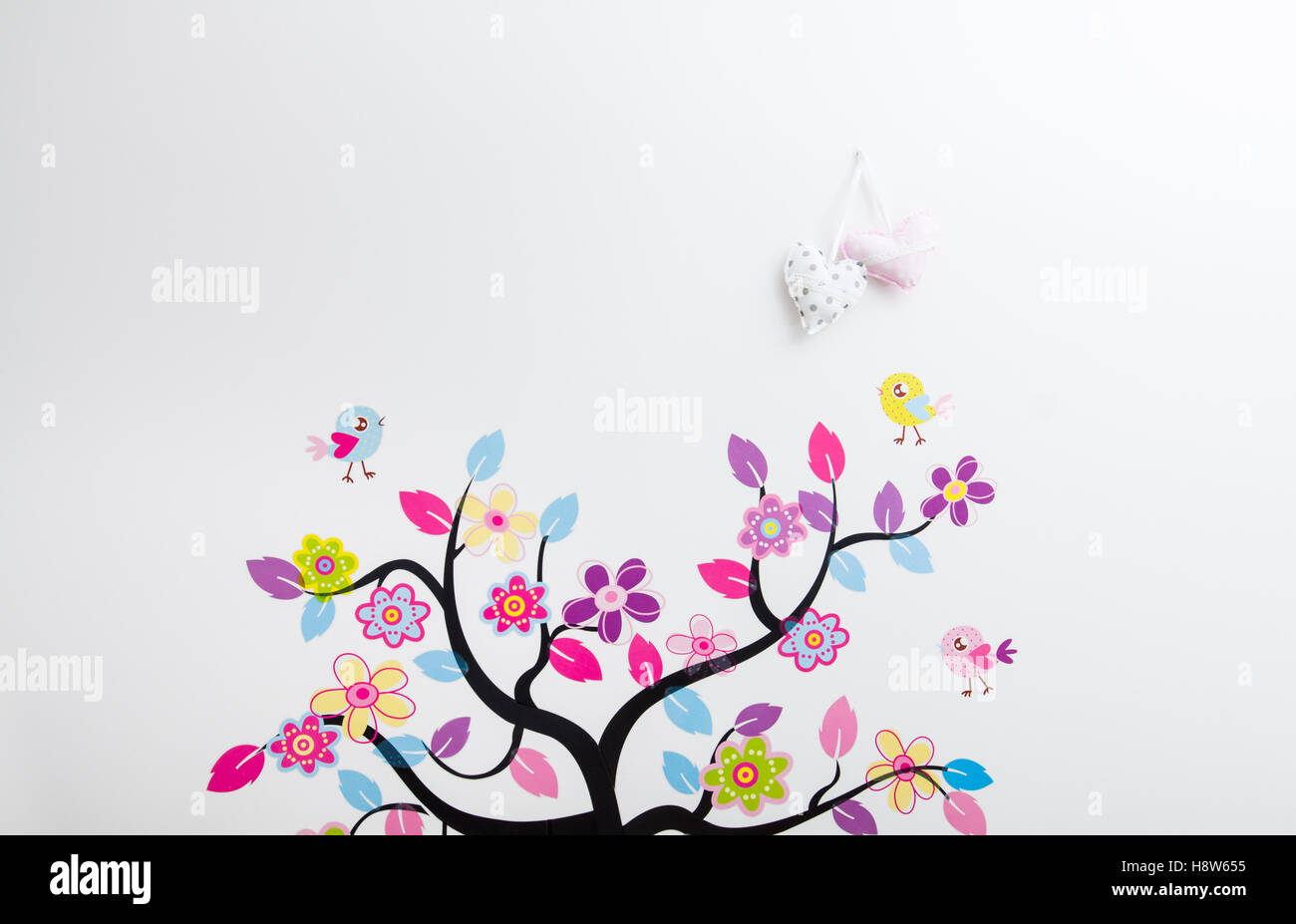 Handmade posters stuck tree with birds on the wall in children's room ...