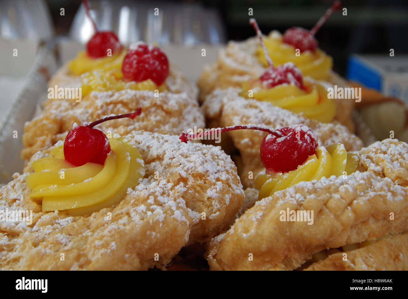 Italian zeppole pastries with cream and cherries Stock Photo - Alamy