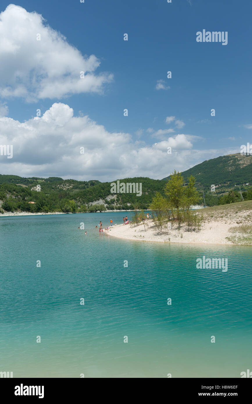 MACERATA, ITALY- AUGUST 19: undefined people on the beach at Fiastra ...