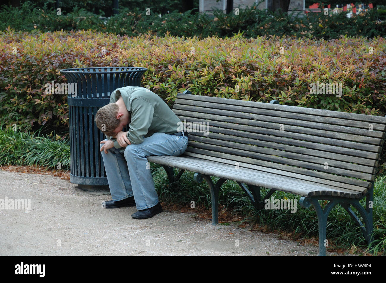 Man on bench Stock Photo - Alamy