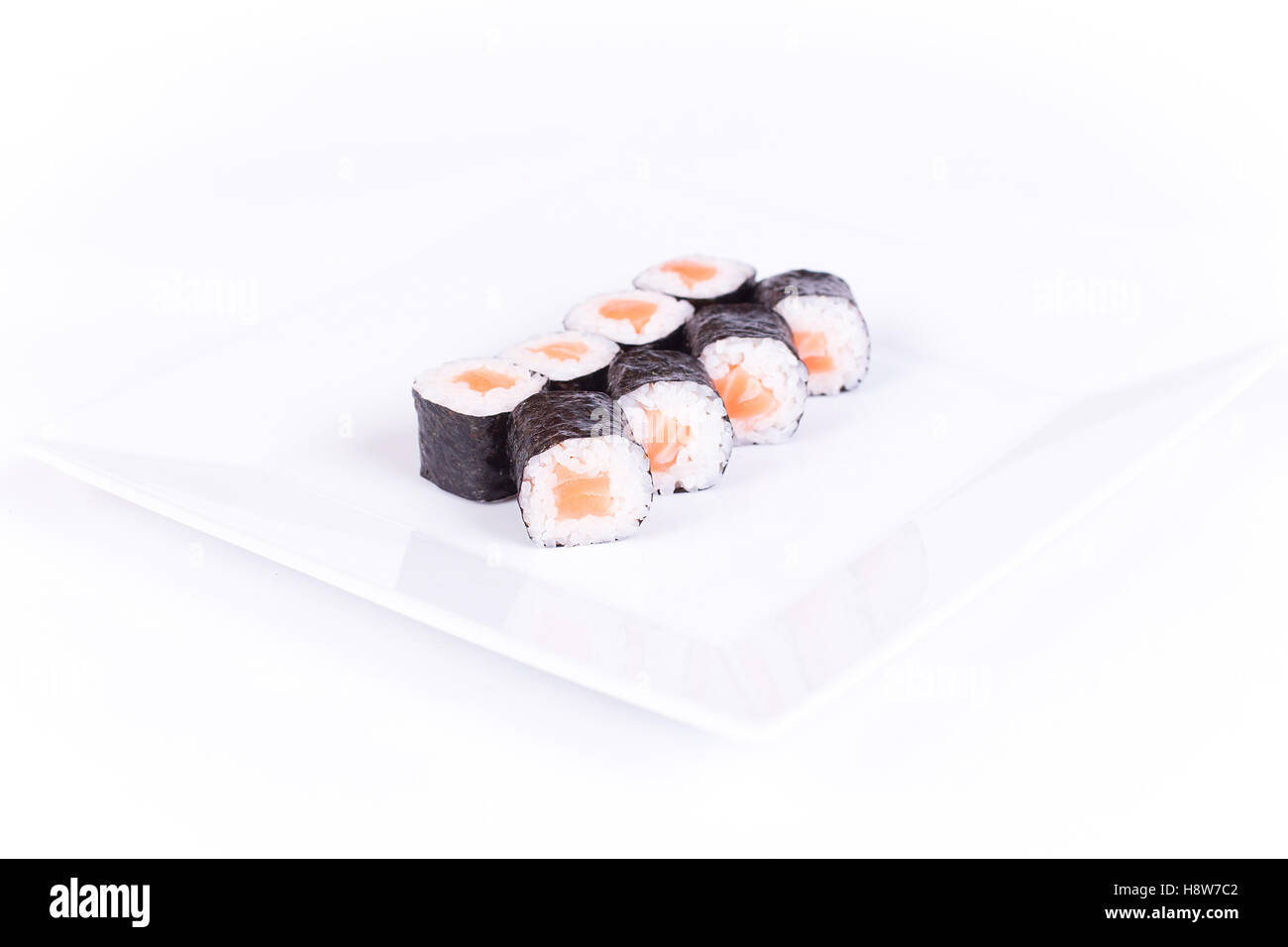 Sushi plate on white background Stock Photo - Alamy