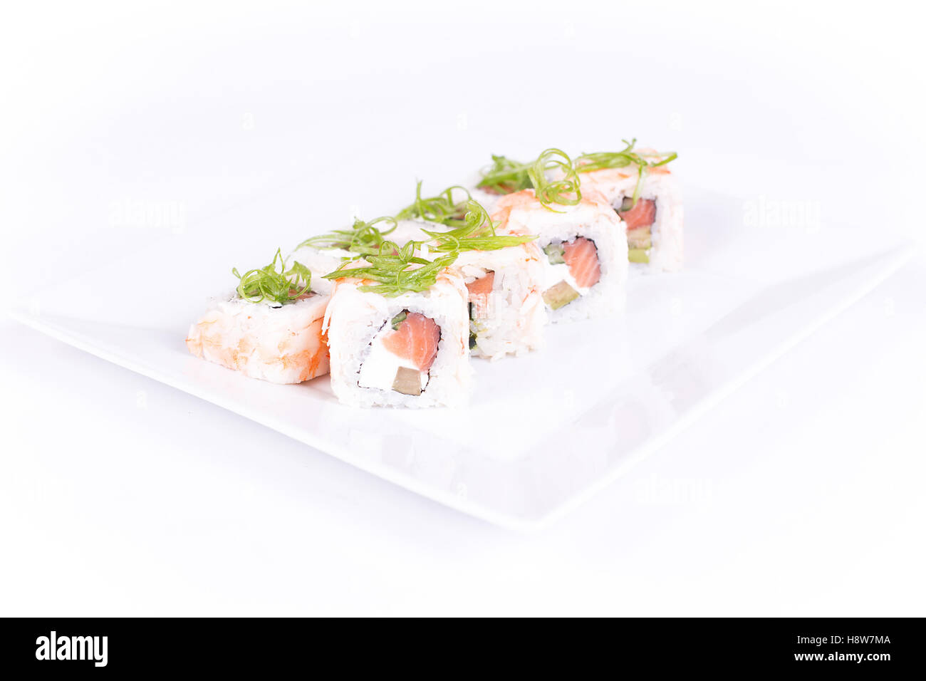 Sushi plate on white background Stock Photo - Alamy