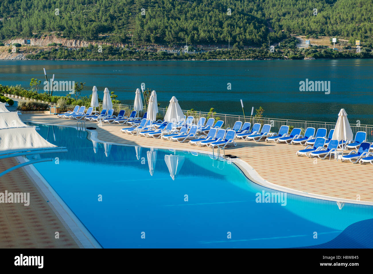 Nice swimming pool outdoors on bright summer day Stock Photo - Alamy
