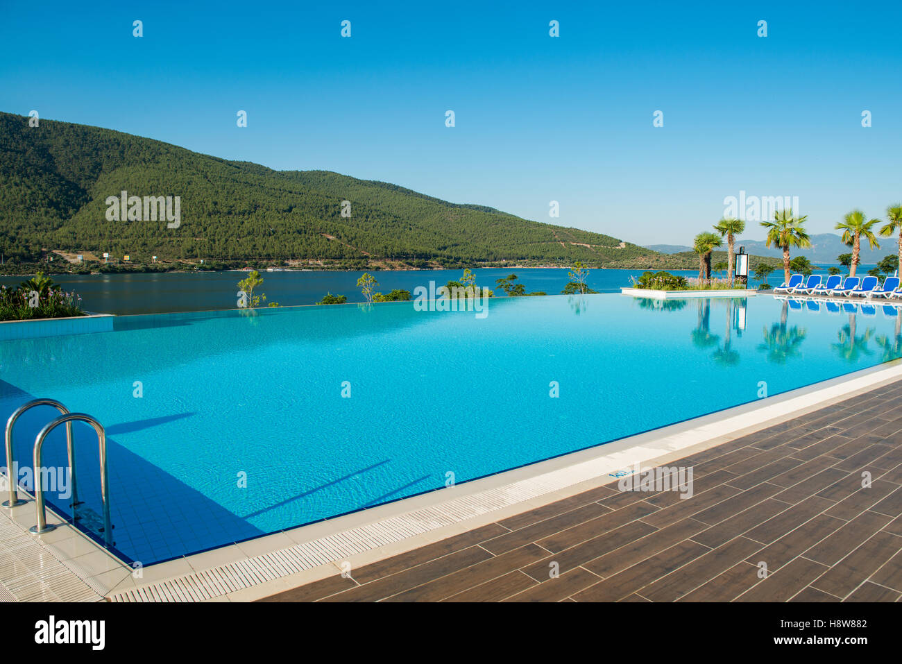 Nice swimming pool outdoors on bright summer day Stock Photo - Alamy