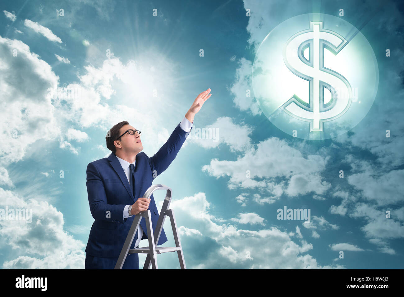 Businessman reaching out to dollars Stock Photo - Alamy