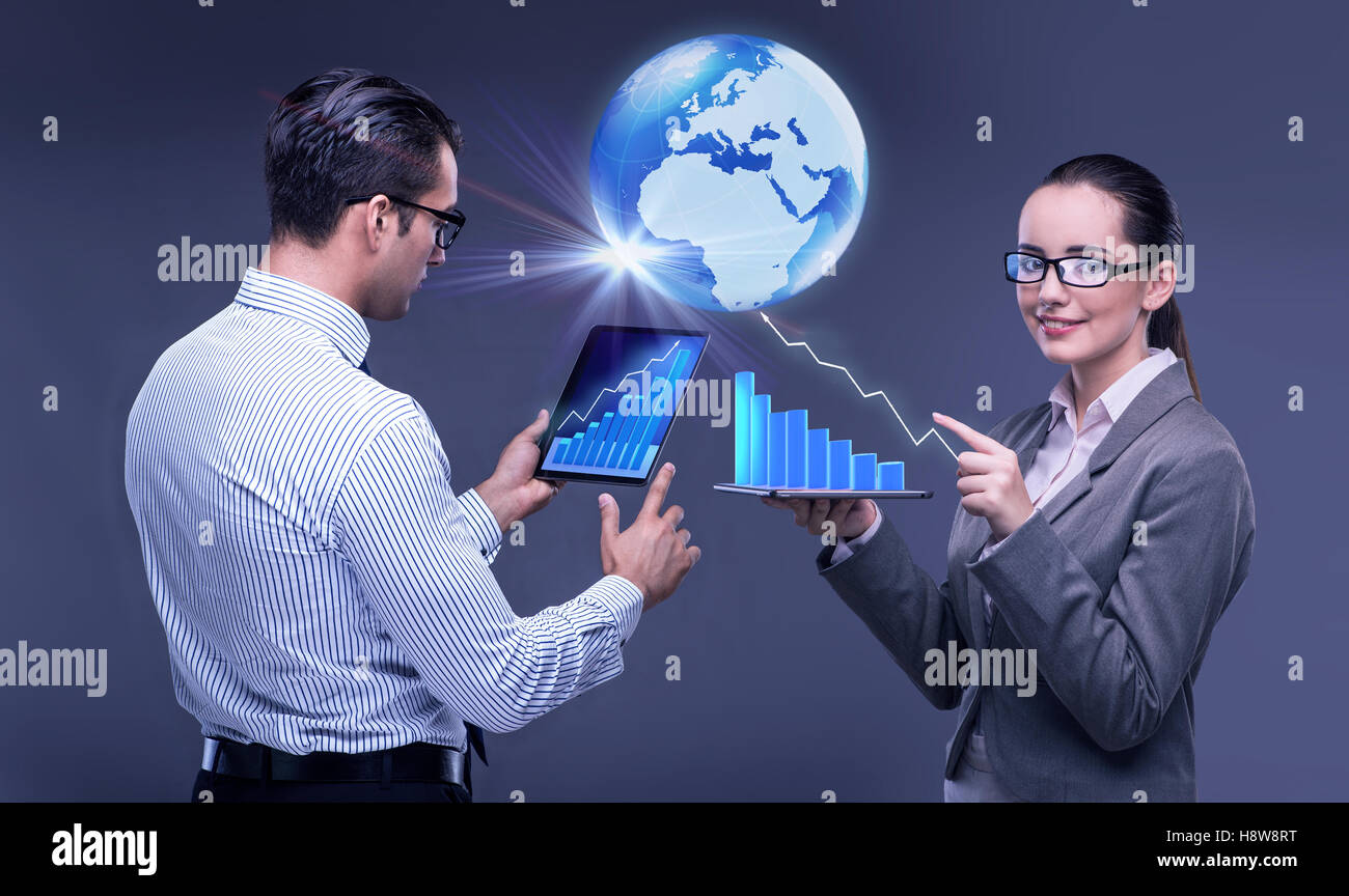 Business people discussing stock chart trends Stock Photo - Alamy