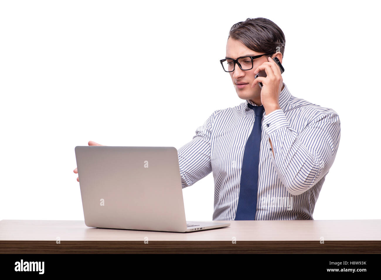 Handsome businessman working with laptop computer isolated on white ...