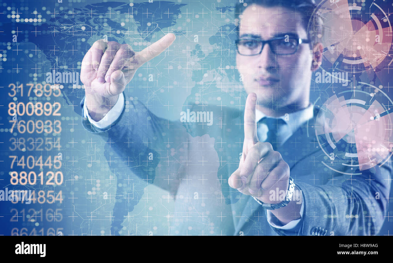 Businessman pressing virtual buttons in futuristic concept Stock Photo ...