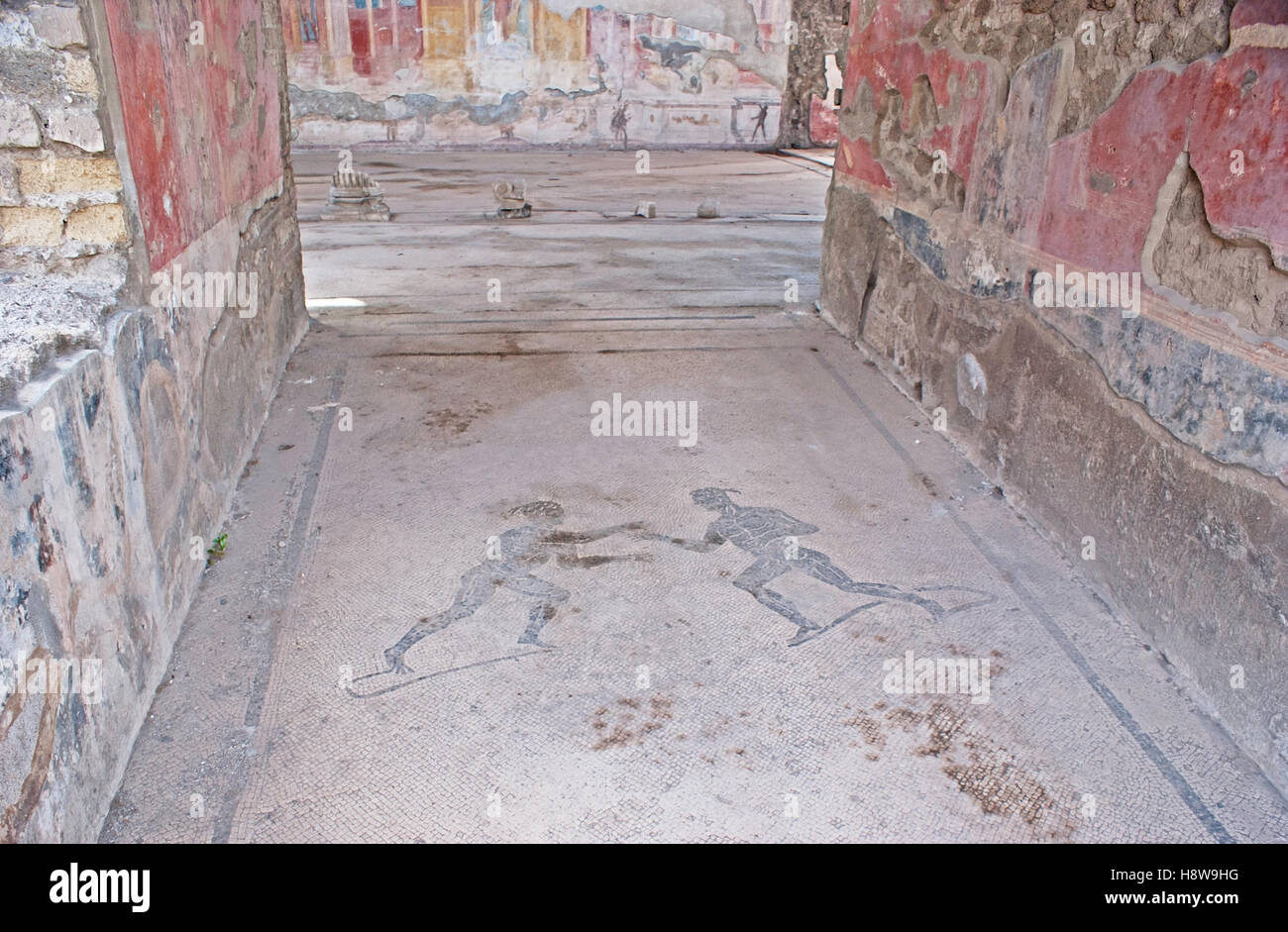 The ancient floor mosaic at the entrance to Roman Villa depicting two ...