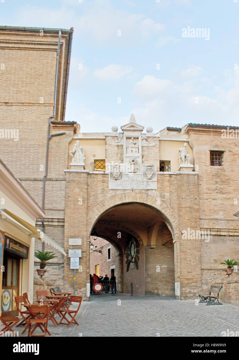 The brick Roman Gate (Porta Romana) decorated with white marble ...