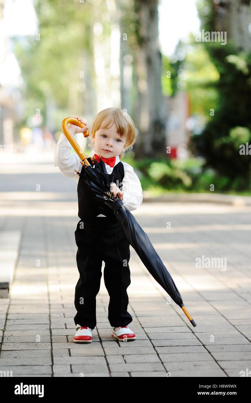 child with umbrella in hands Stock Photo - Alamy
