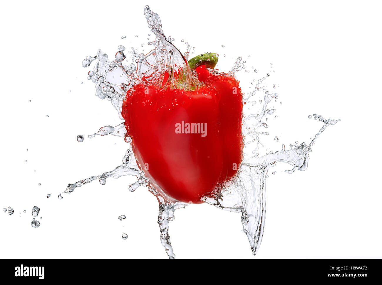 Water splash with bell pepper isolated Stock Photo - Alamy
