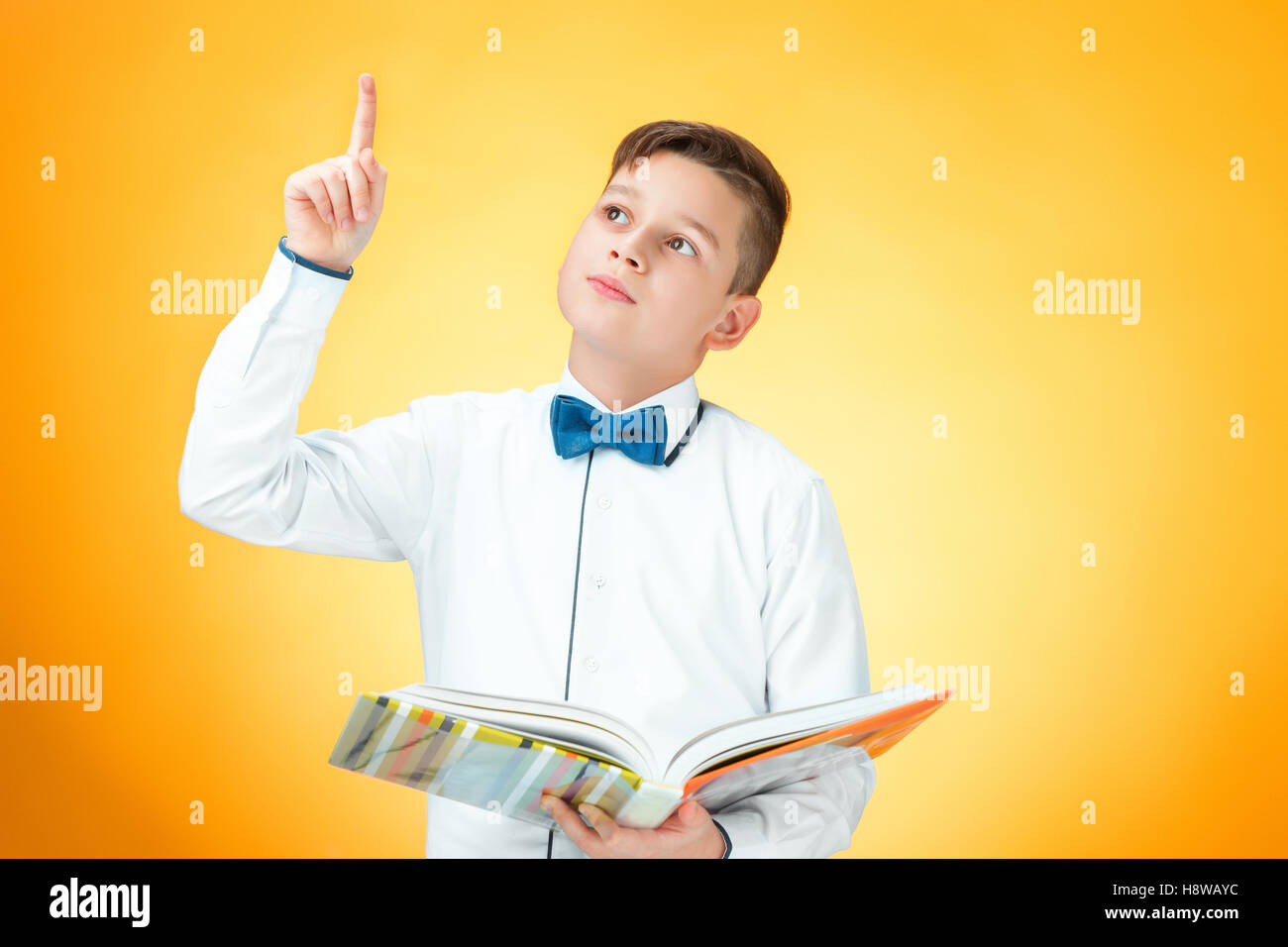 The boy with book Stock Photo - Alamy