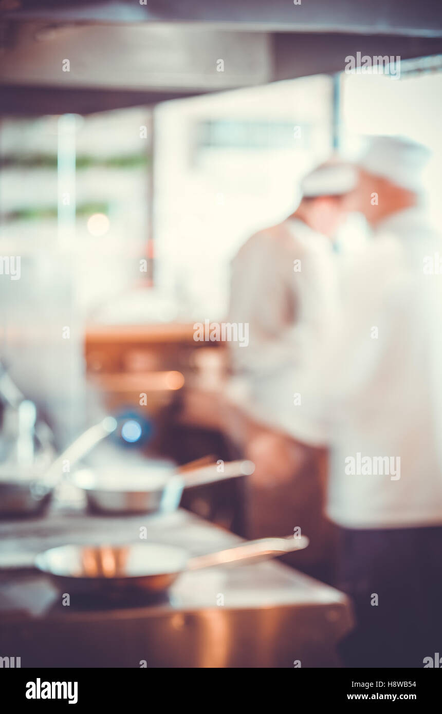 chefs cooking in the kitchen Stock Photo - Alamy
