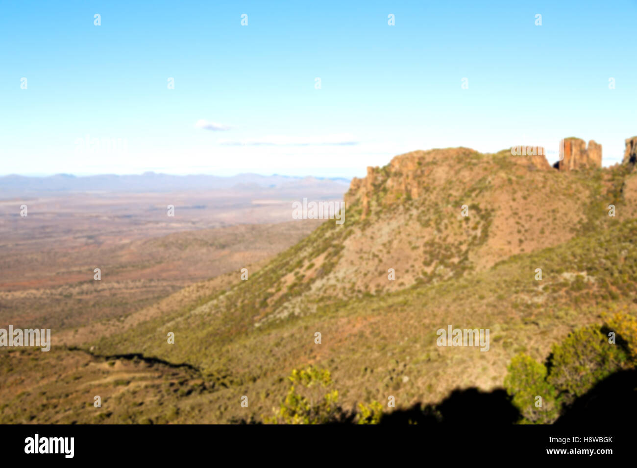blur in south africa valley of desolation dirty road rock tree and sky ...