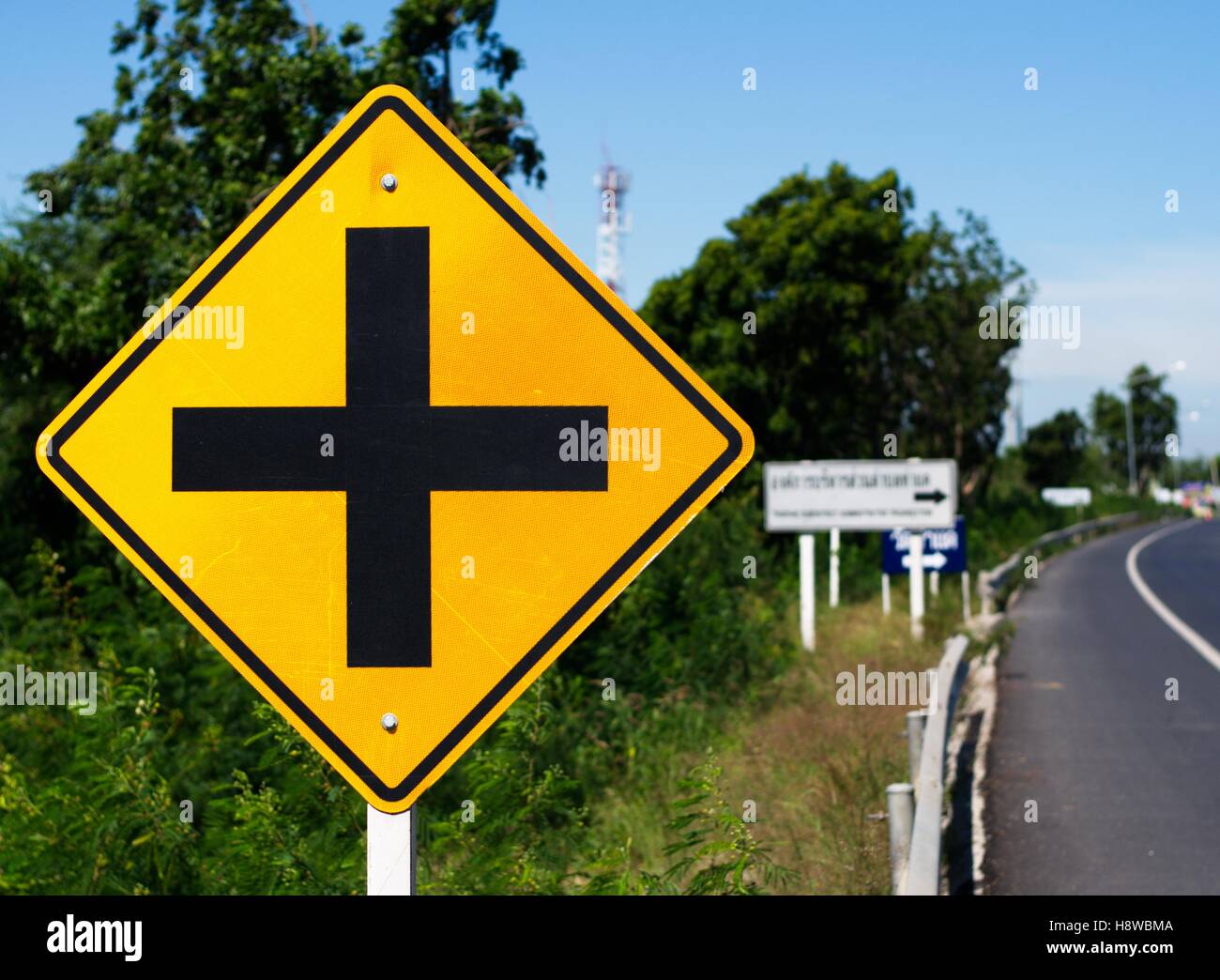 Traffic sign symbols in black on a yellow ground Stock Photo - Alamy