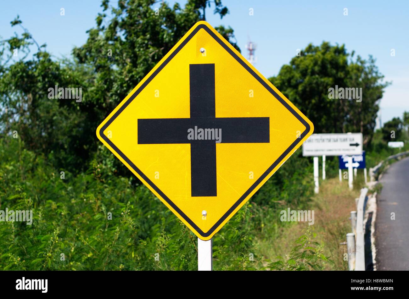Traffic sign symbols in black on a yellow ground Stock Photo - Alamy