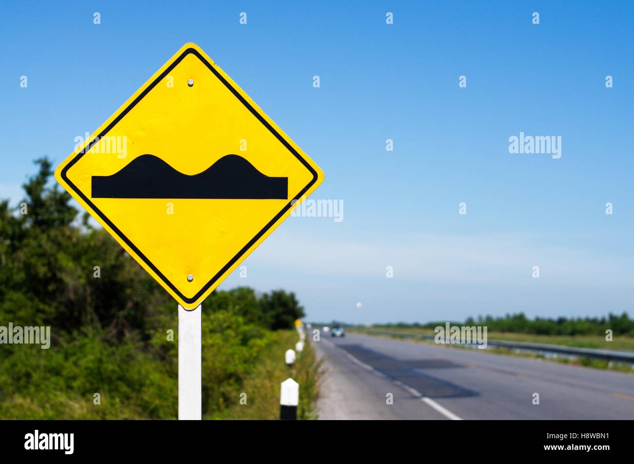 Traffic sign symbols in black on a yellow ground Stock Photo - Alamy