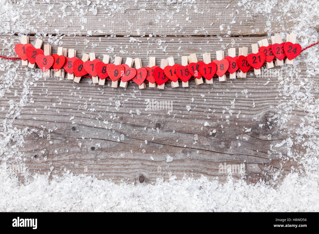 Traditional Christmas advent calendar with snow Stock Photo - Alamy