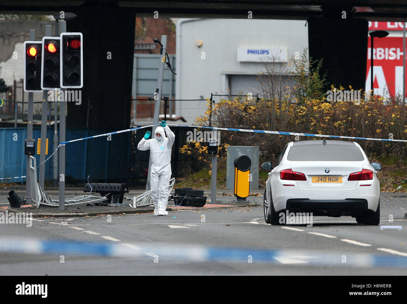 Police forensic officers at the scene where a man died after being shot ...