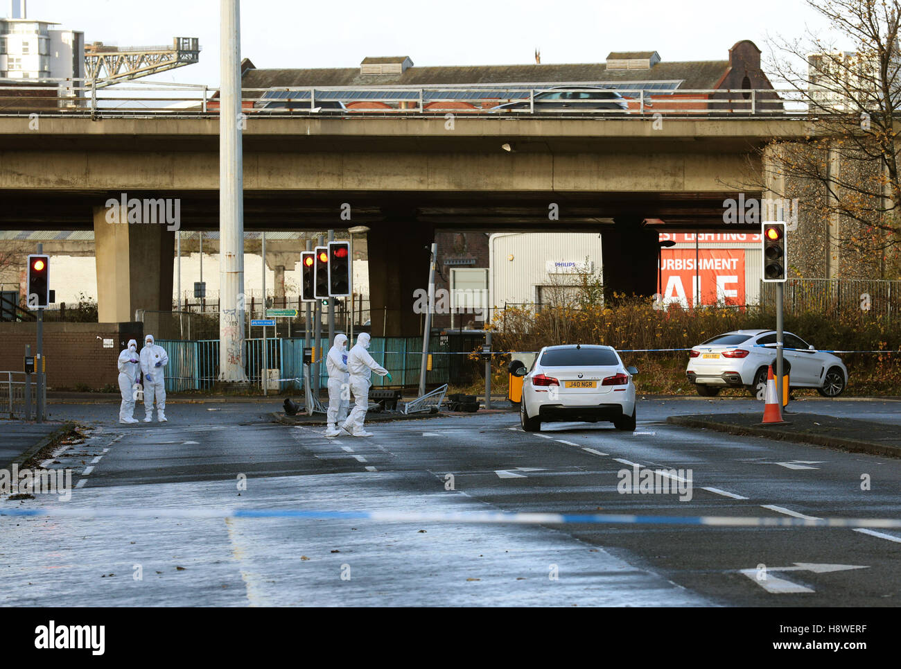 Police forensic officers at the scene where a man died after being shot ...