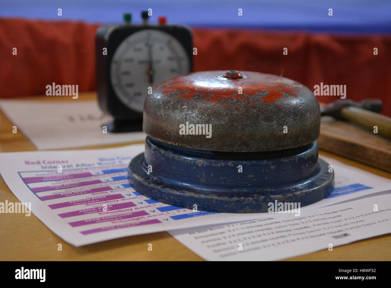 Bell and clock for boxing officials Stock Photo - Alamy