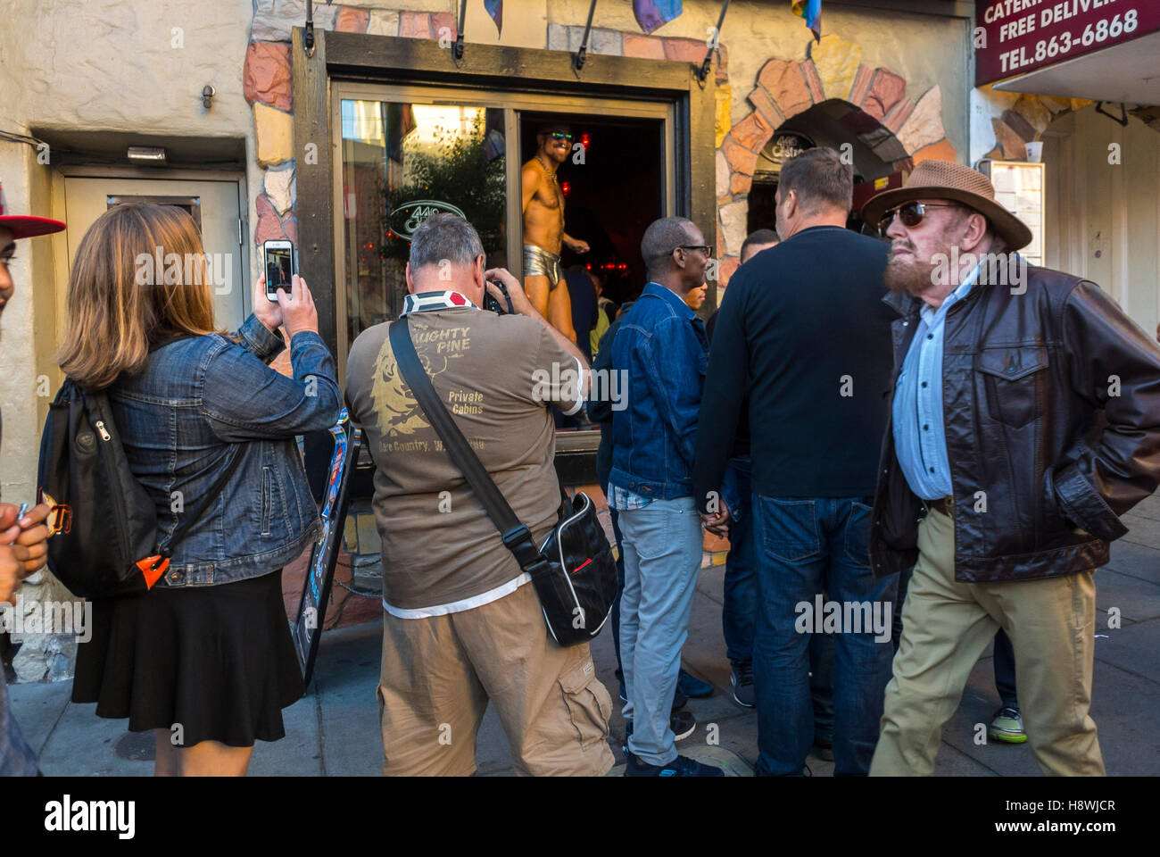 San Francisco, CA, USA, Crowd of Tourists, Taking photos of Male Go-Go ...