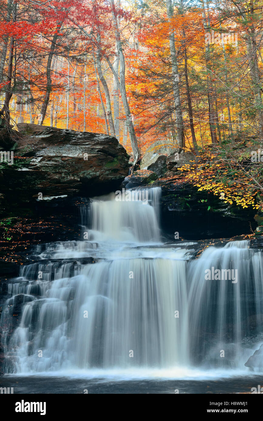 Autumn waterfalls in park with colorful foliage Stock Photo - Alamy