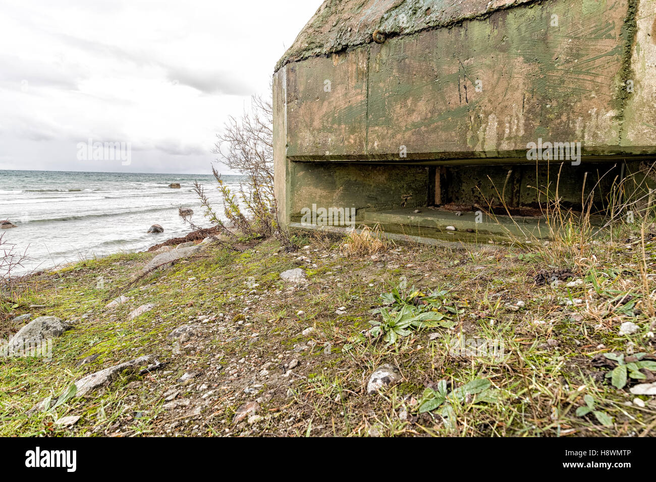 Bunker by Ocean with a cloudy sky Stock Photo - Alamy