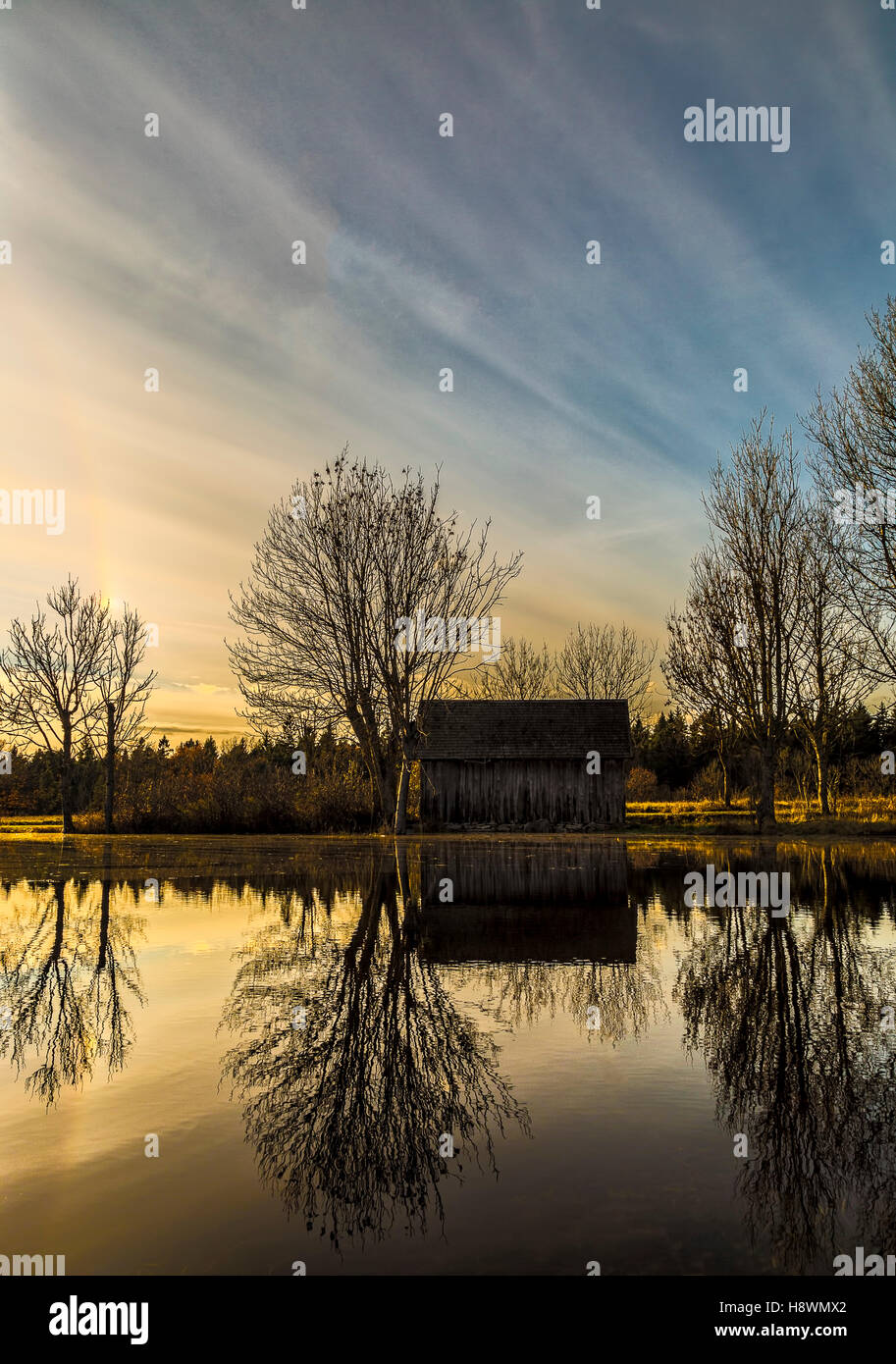 Old Wooden Building by pond Stock Photo - Alamy