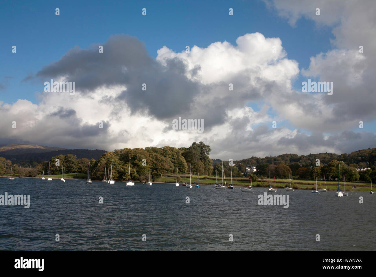 Storm clouds passing across the mountains to the north of Windermere ...