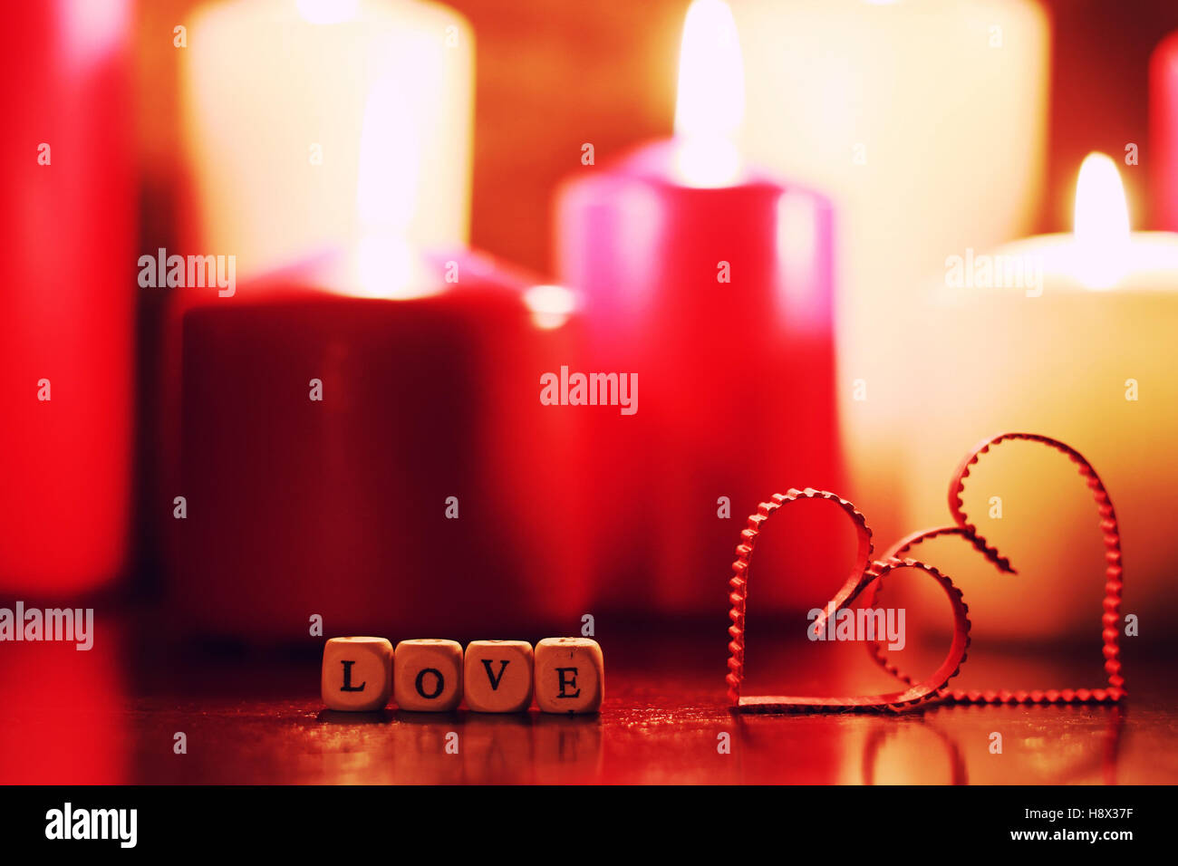 macro candle light with heart shape Stock Photo - Alamy