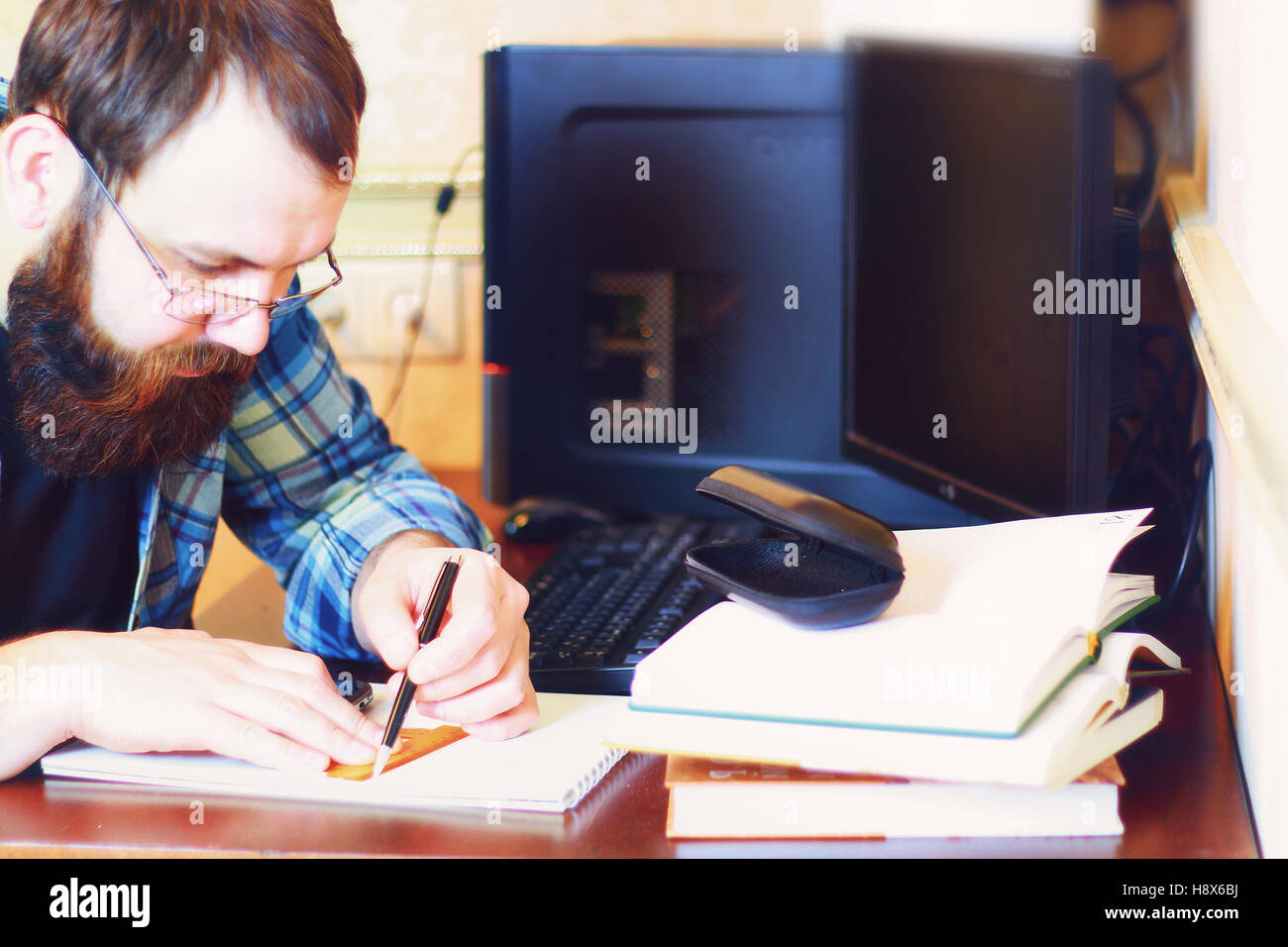 male work computer pen write Stock Photo - Alamy