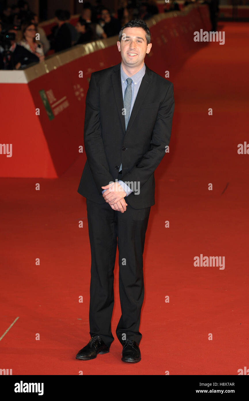 Adam leon attending the premiere of tramps hi-res stock photography and ...