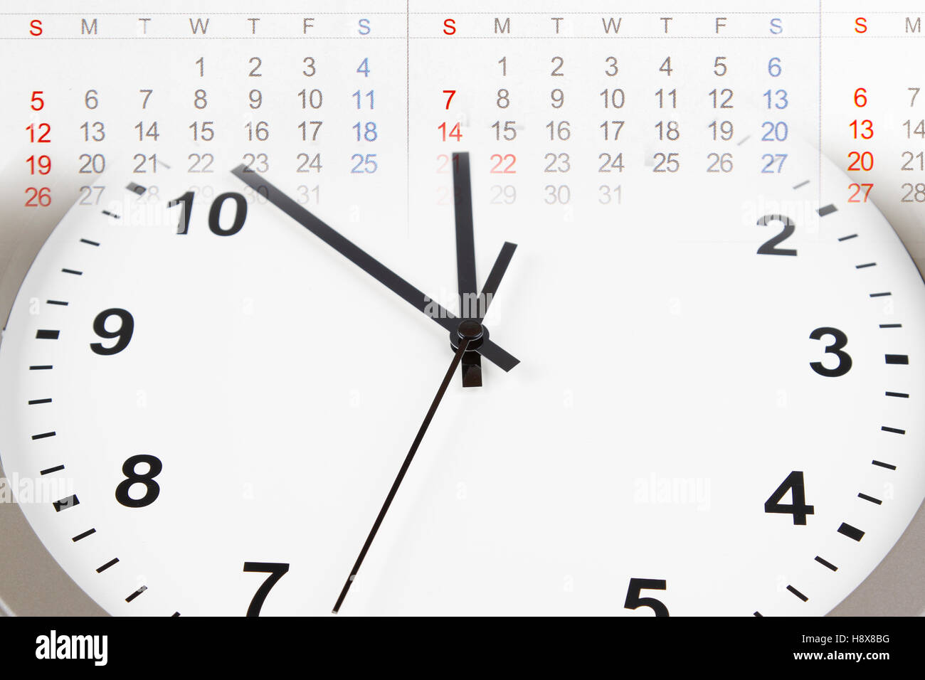 Clock face and calendar composite Stock Photo - Alamy