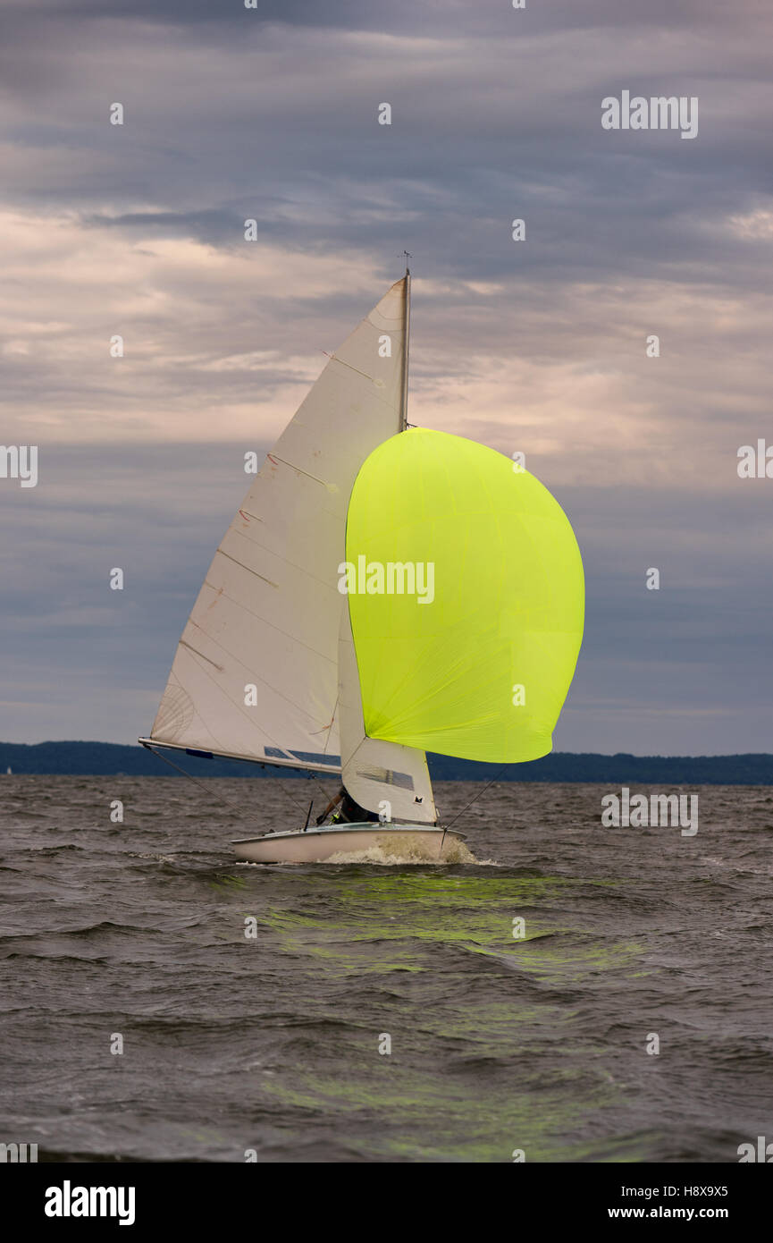 Flying Scot sail boat on a body of water with it's spinnaker up Stock ...