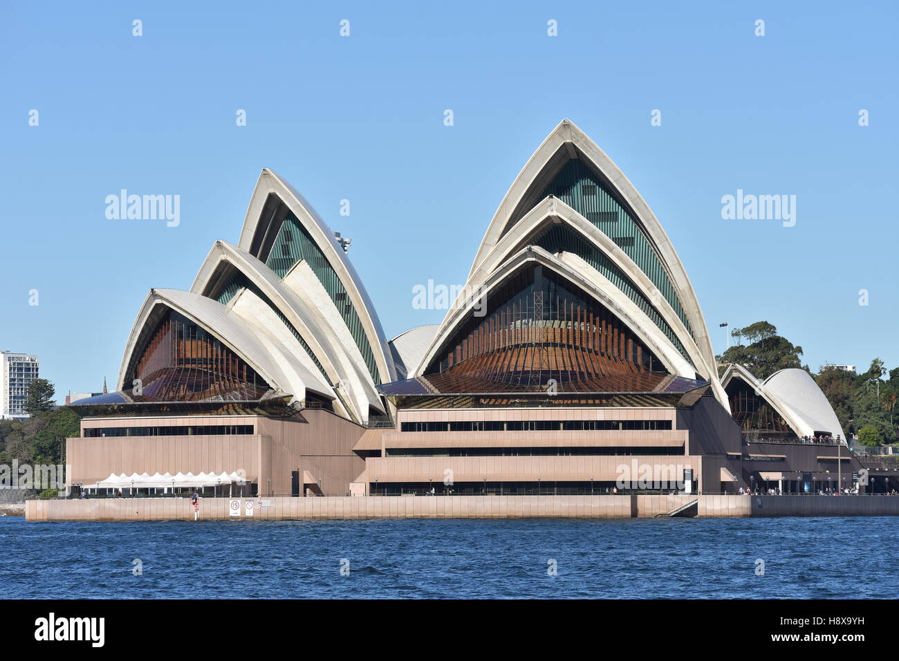 View of iconic Sydney Opera House building from harbour surface Stock ...