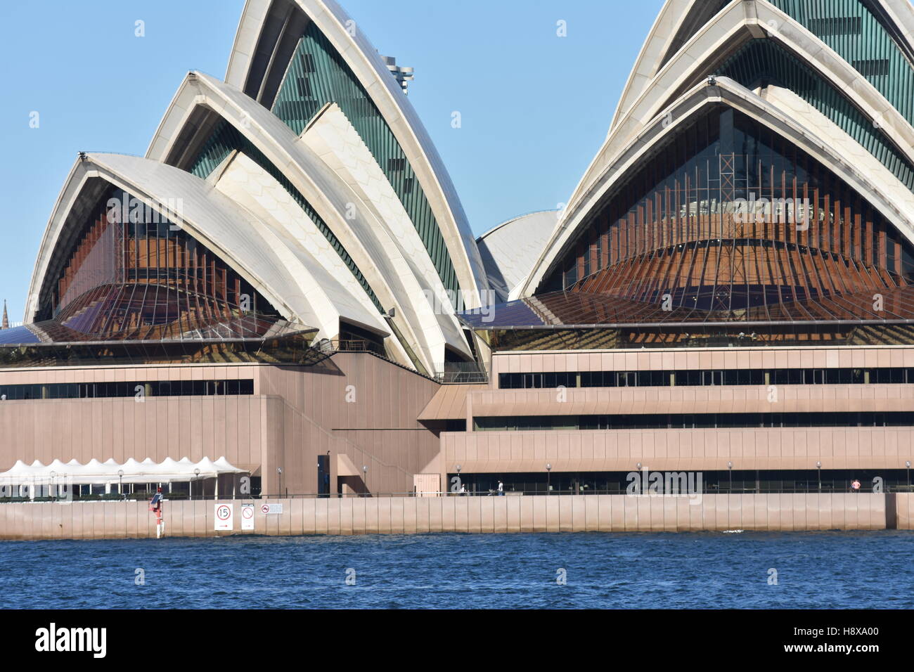 Closer view of iconic Sydney Opera House building from the sea Stock ...