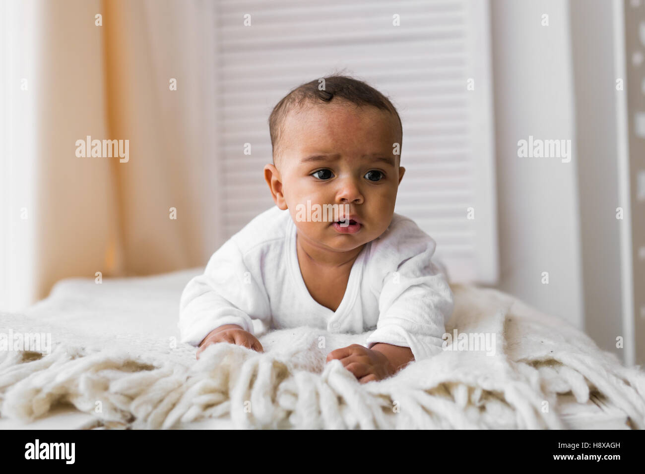 Portrait of a mixed race baby boy Stock Photo - Alamy