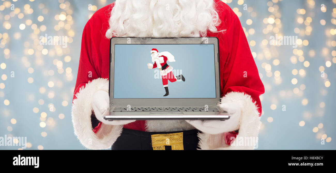 close up of santa claus with laptop Stock Photo - Alamy