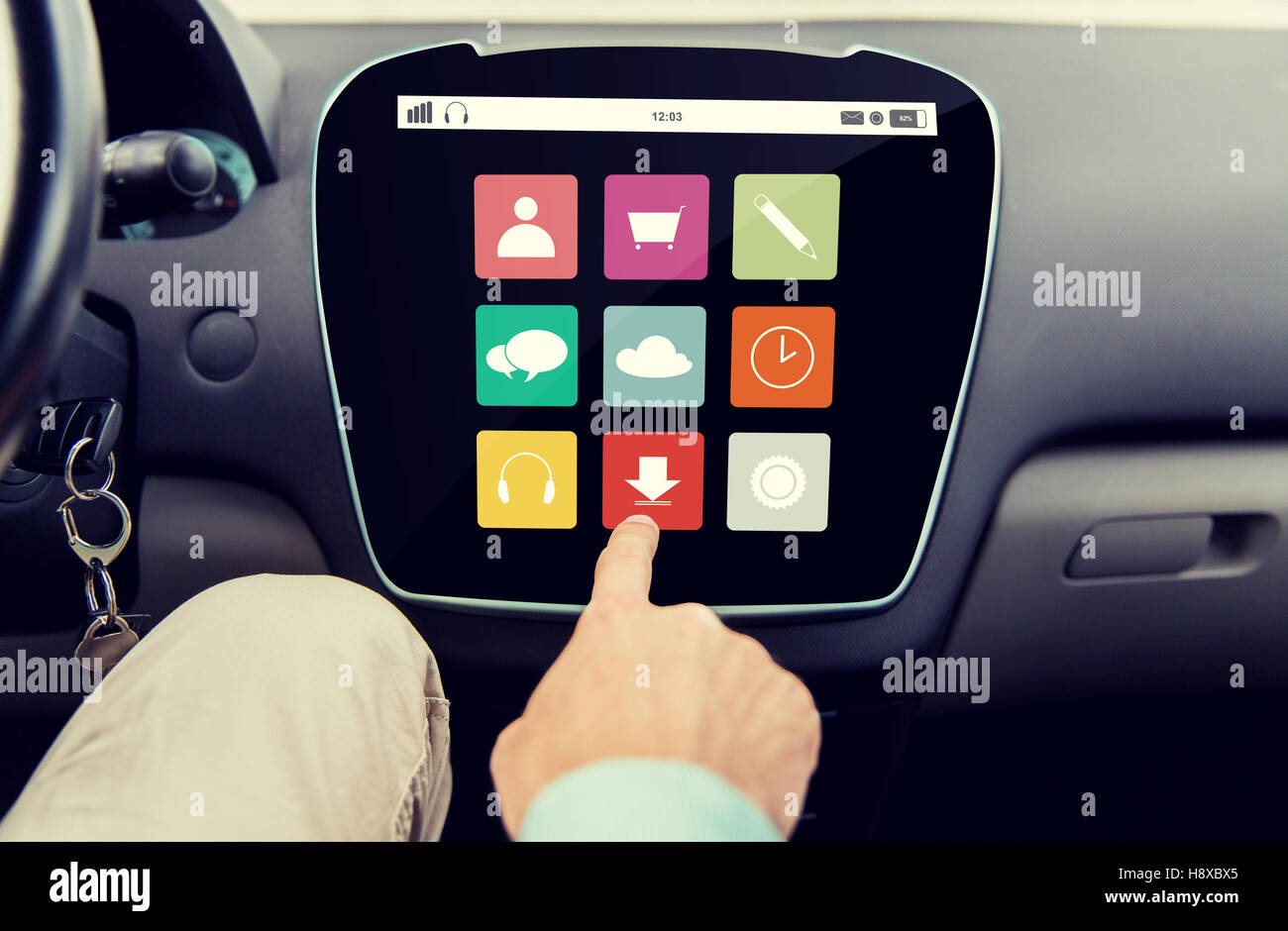close up of hand and menu icons on car computer Stock Photo - Alamy