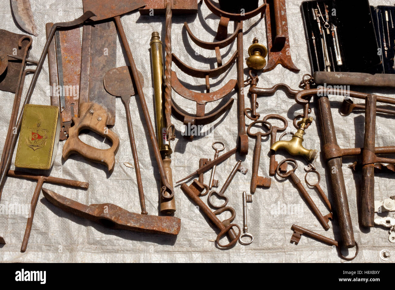 Old rusty metal tools on a flea market in Madrid Stock Photo - Alamy