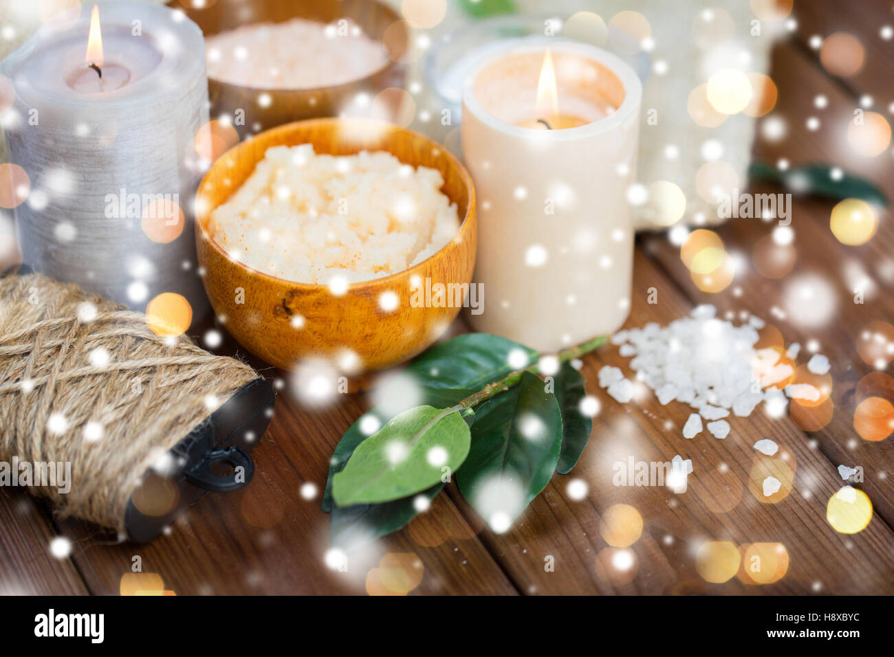 natural body scrub and candles on wood Stock Photo - Alamy