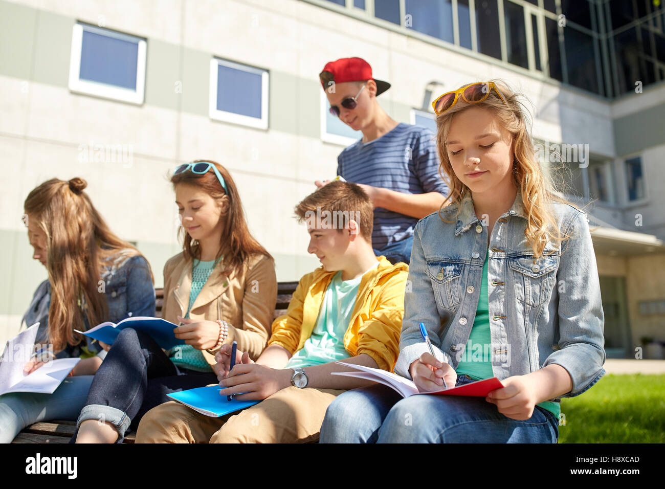 group of students with notebooks at school yard Stock Photo - Alamy