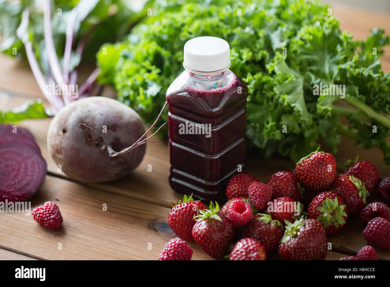 bottle with beetroot juice, fruits and vegetables Stock Photo - Alamy